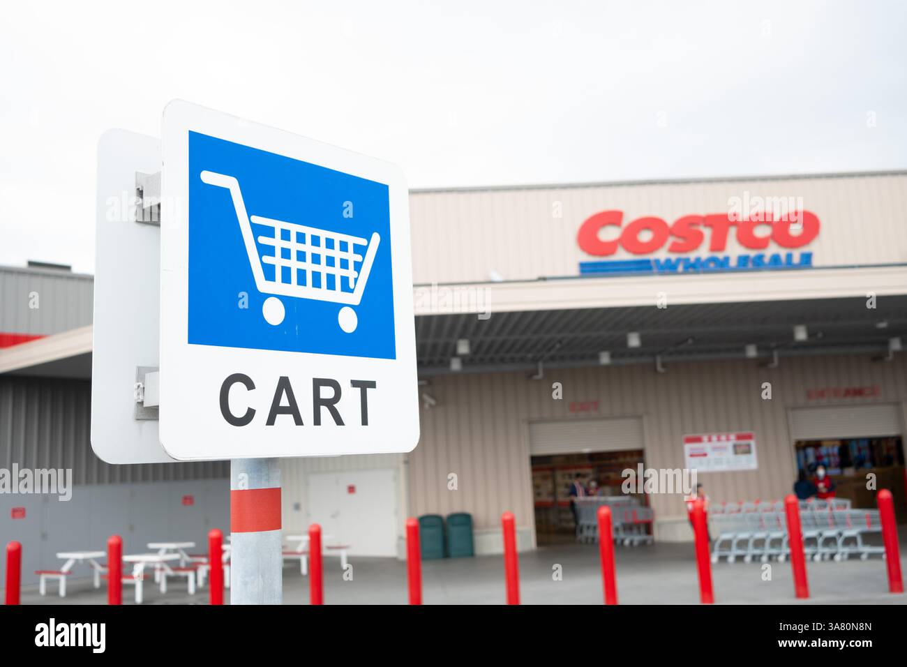Costco cart corral sign for returning shopping carts Stock Photo - Alamy
