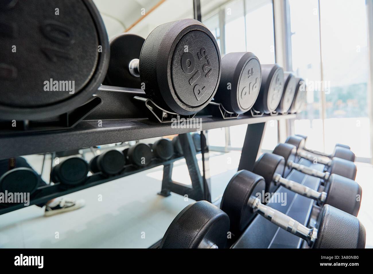 Black dumbbell rack hi-res stock photography and images - Alamy