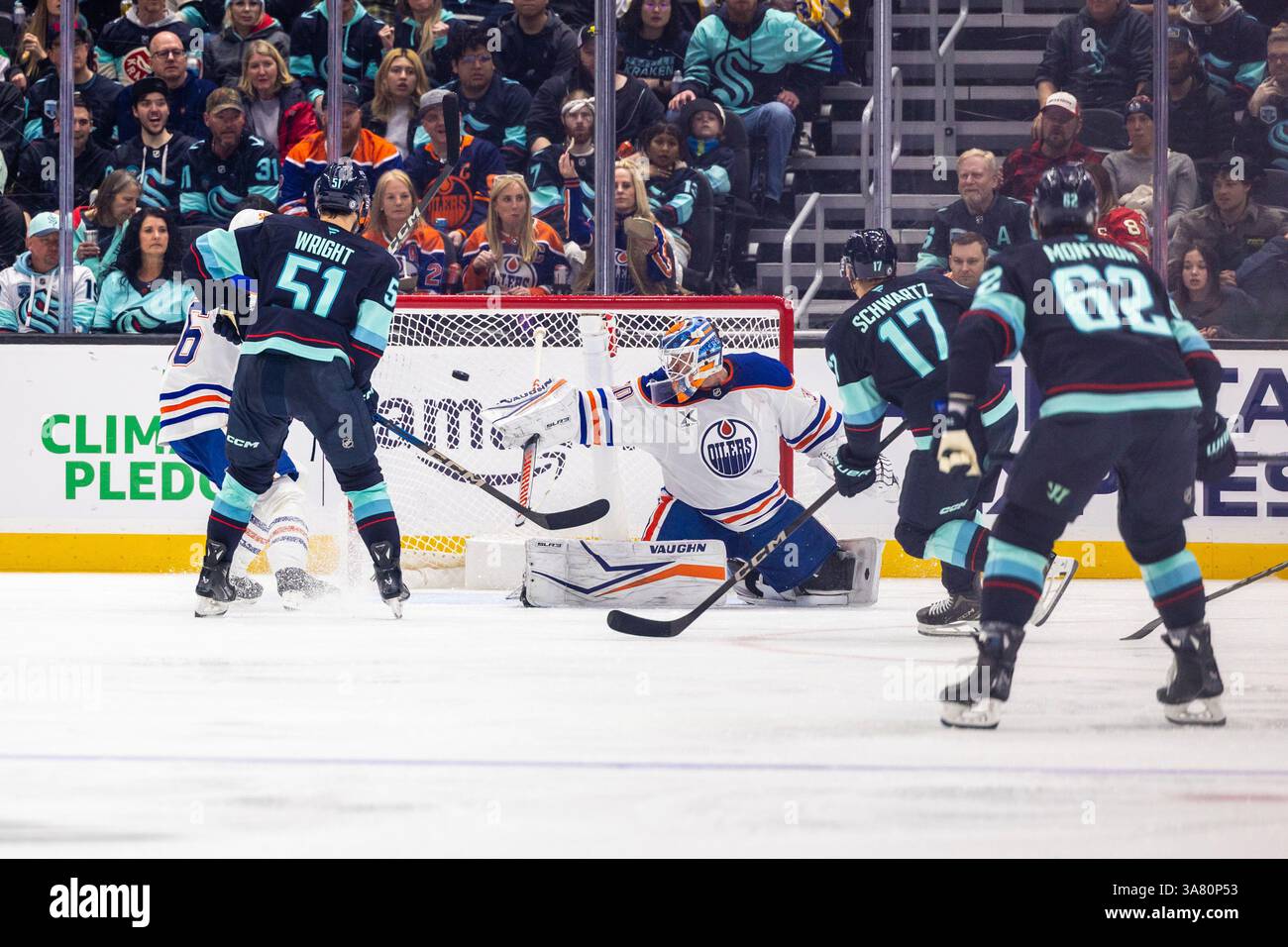 Seattle Kraken center Jaden Schwartz (17) shoots the puck past Edmonton ...