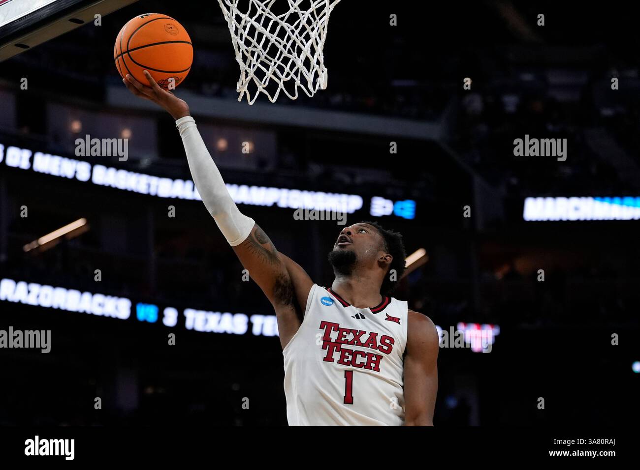 Texas Tech guard Kevin Overton (1) shoots during the second half in the ...