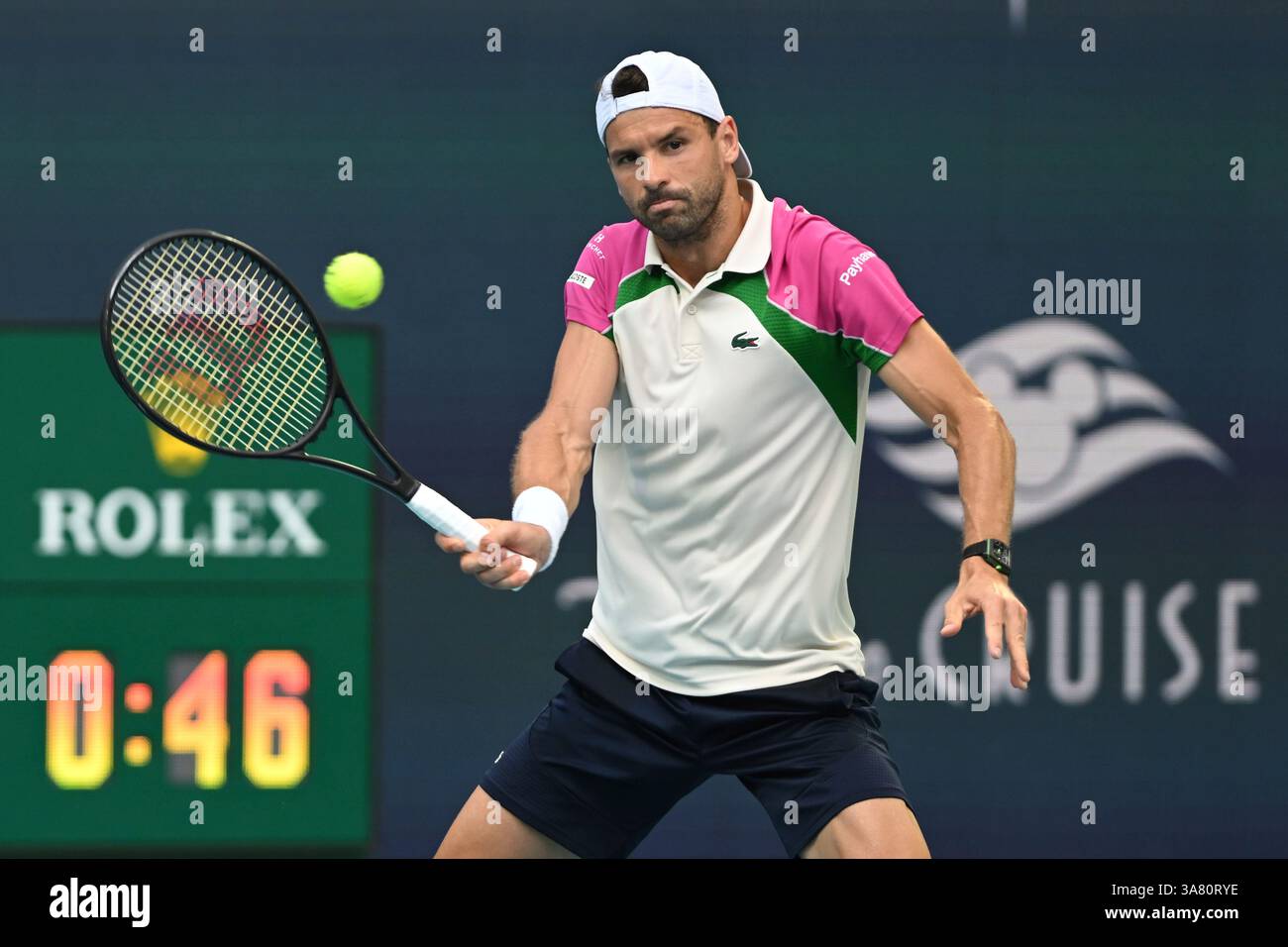MIAMI GARDENS, FL - MARCH 26: Grigor Dimitrov (BUL) in action, against ...