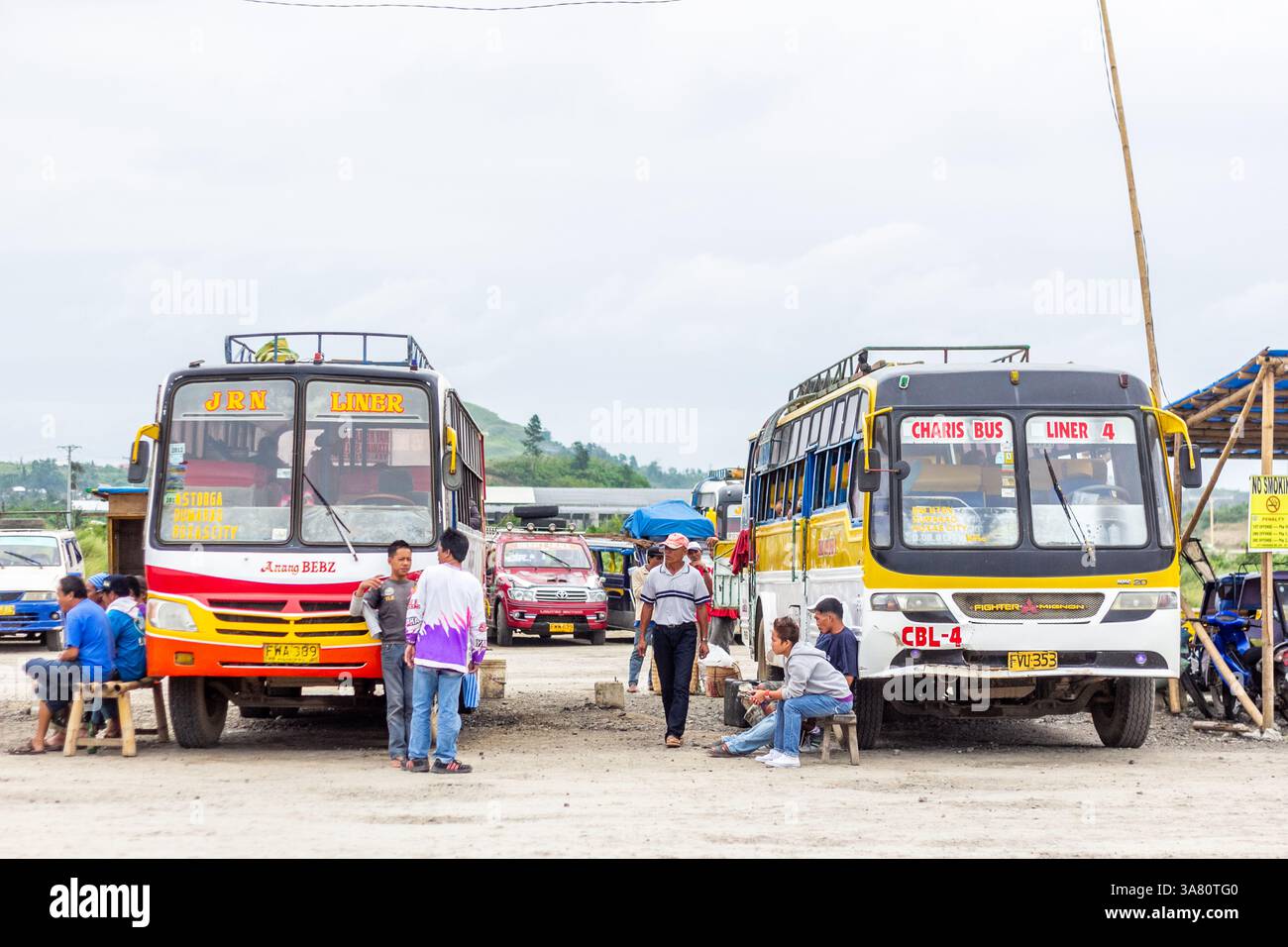 Provincial buses at the Roxas City bus terminal in Capiz, Philippines ...