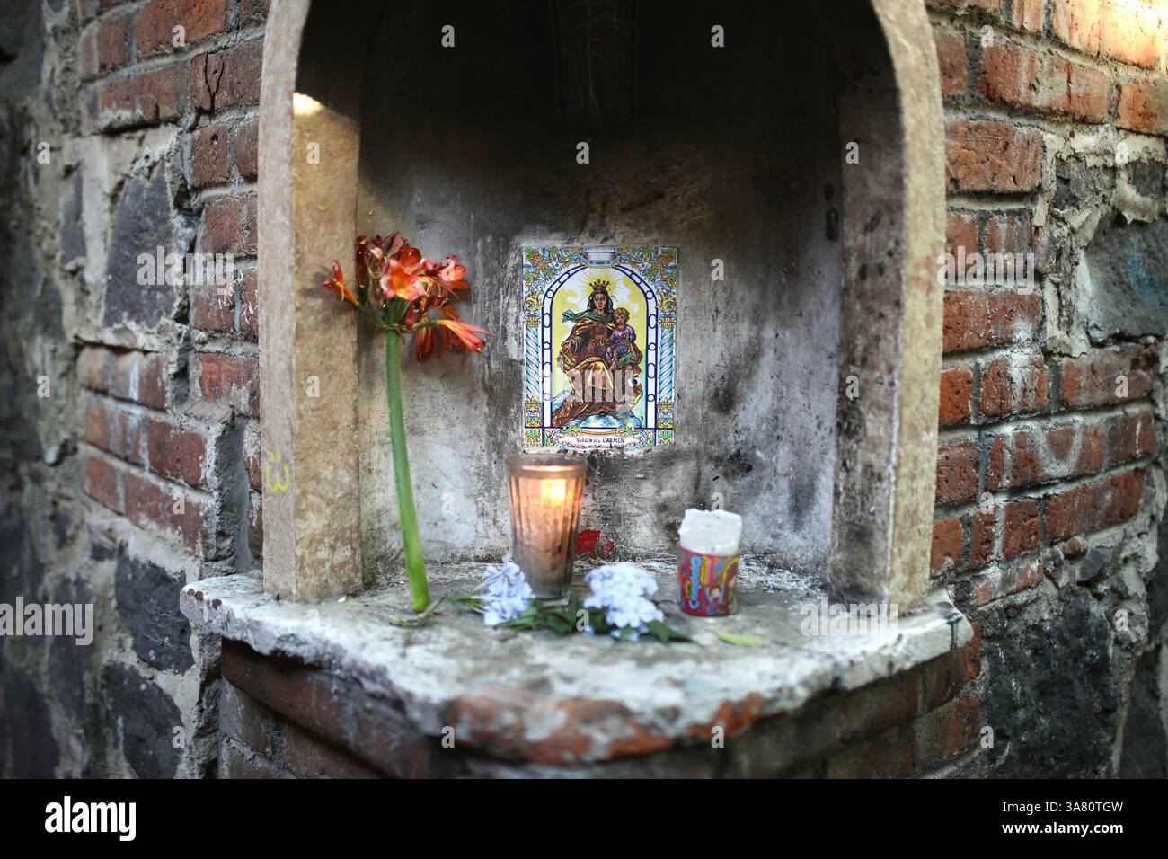 Mexico City, Mexico. 14th Mar, 2025. A Catholic altar with an icon of ...