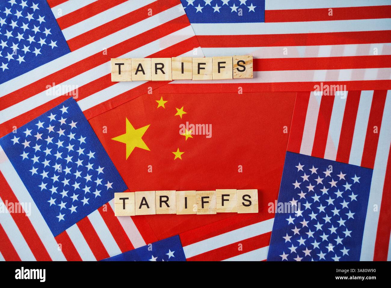 The flag of China and the flags of the United States around it ...