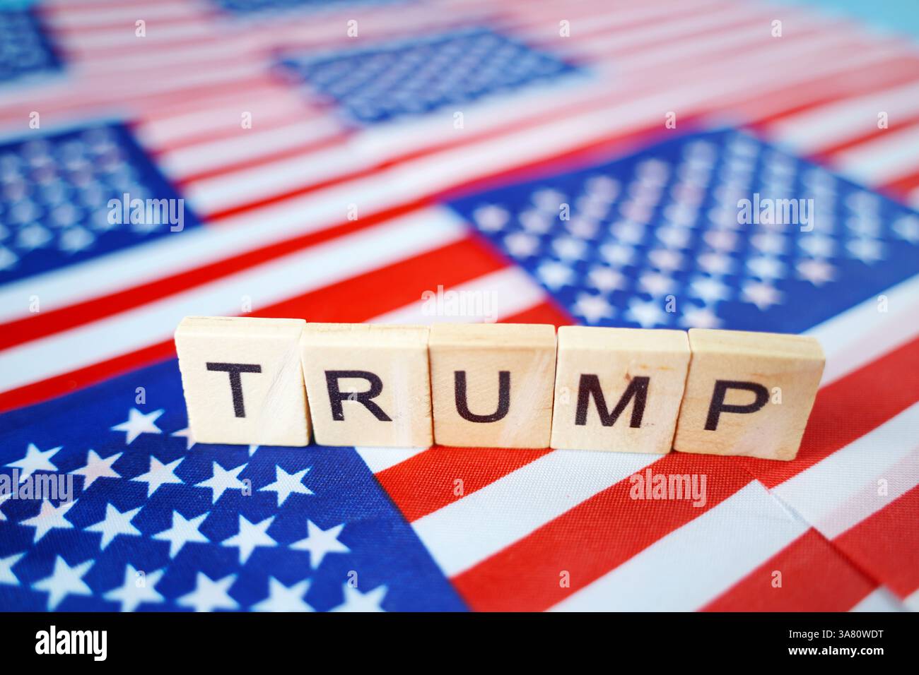The inscription Trump on the background of US flags Stock Photo - Alamy