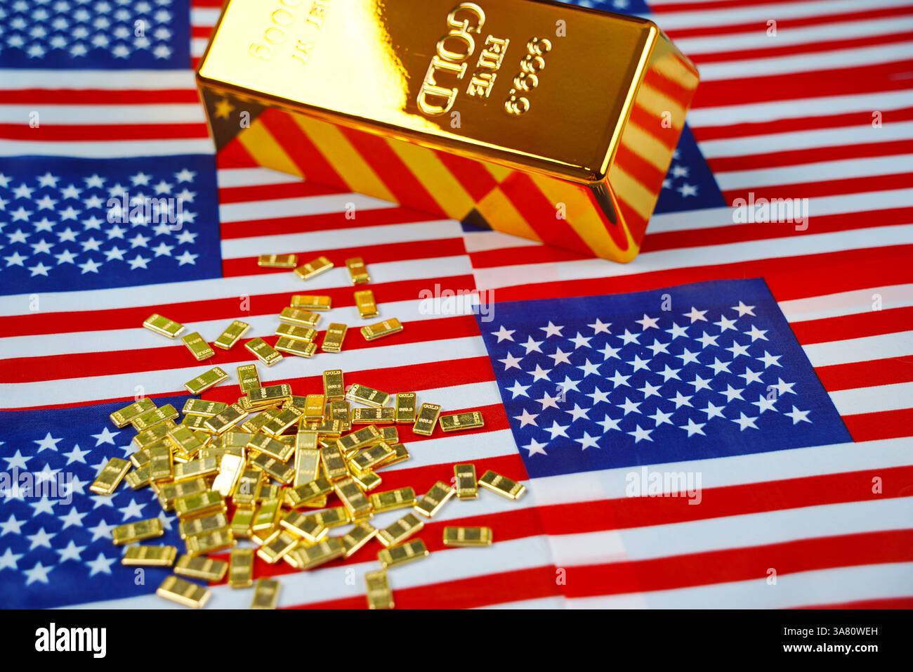 A large gold bar and many small bars on the background of the flags of ...