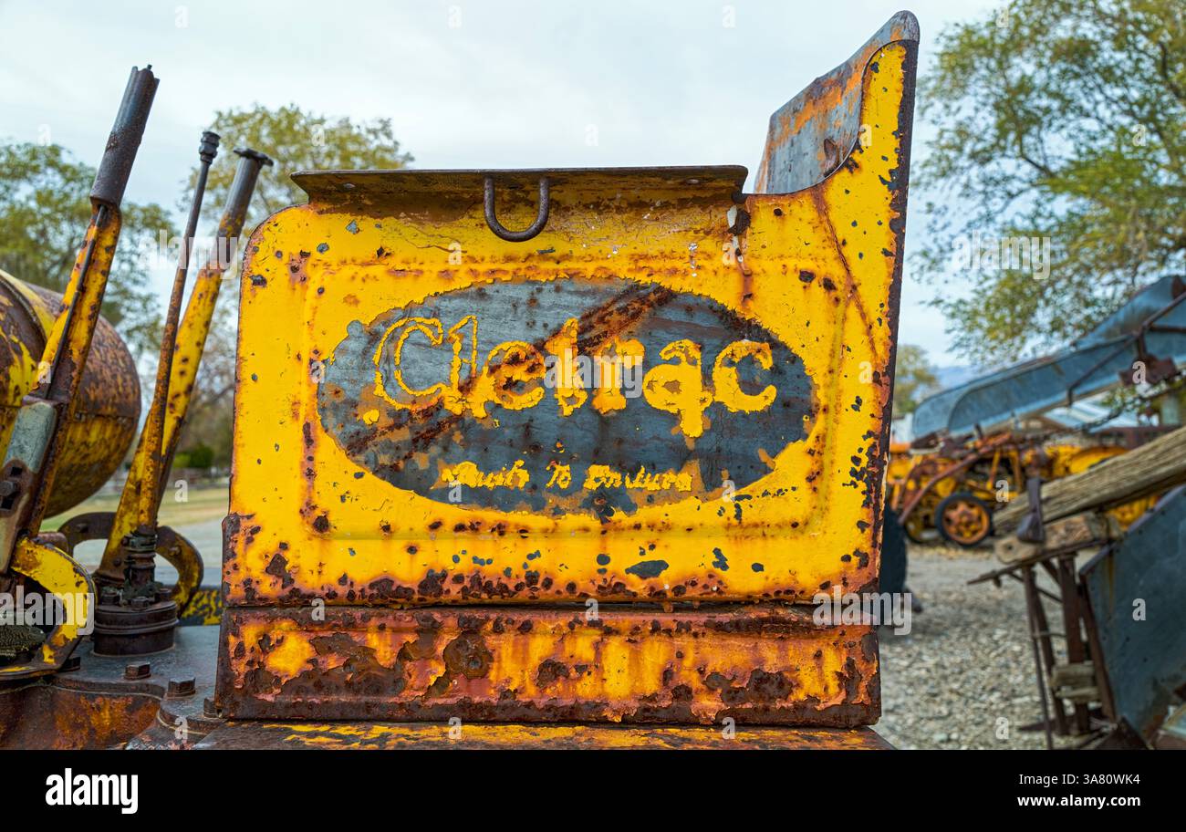 The rusty seat of an antique Cletrac tractor Stock Photo - Alamy