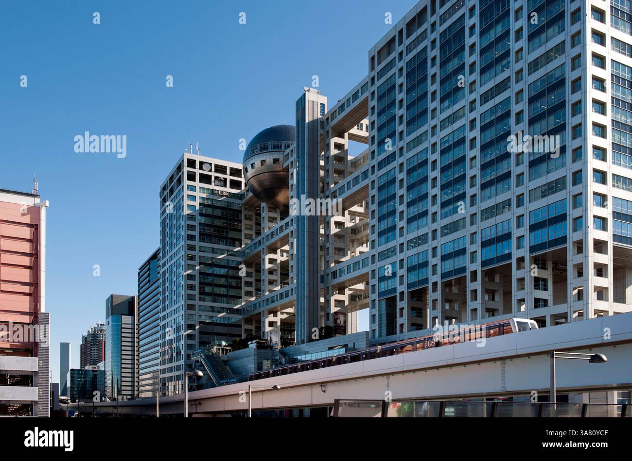 Monorail passing in front of the futuristic-looking Fuji Television ...