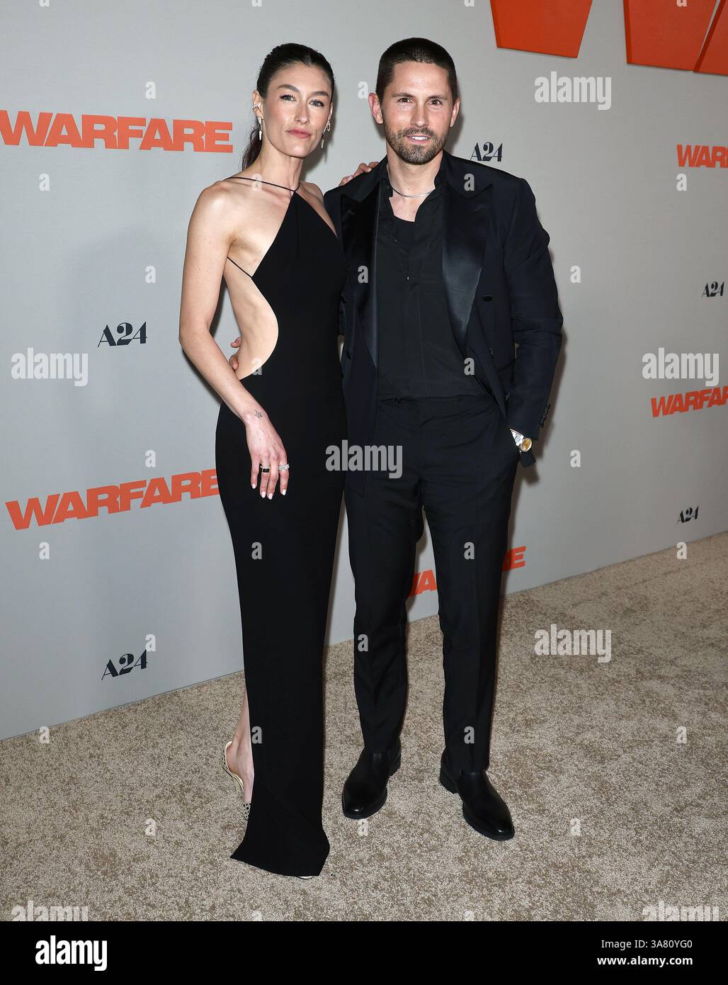 Evan Holtzman arrives at The Los Angeles Red Carpet Premiere of WARFARE ...
