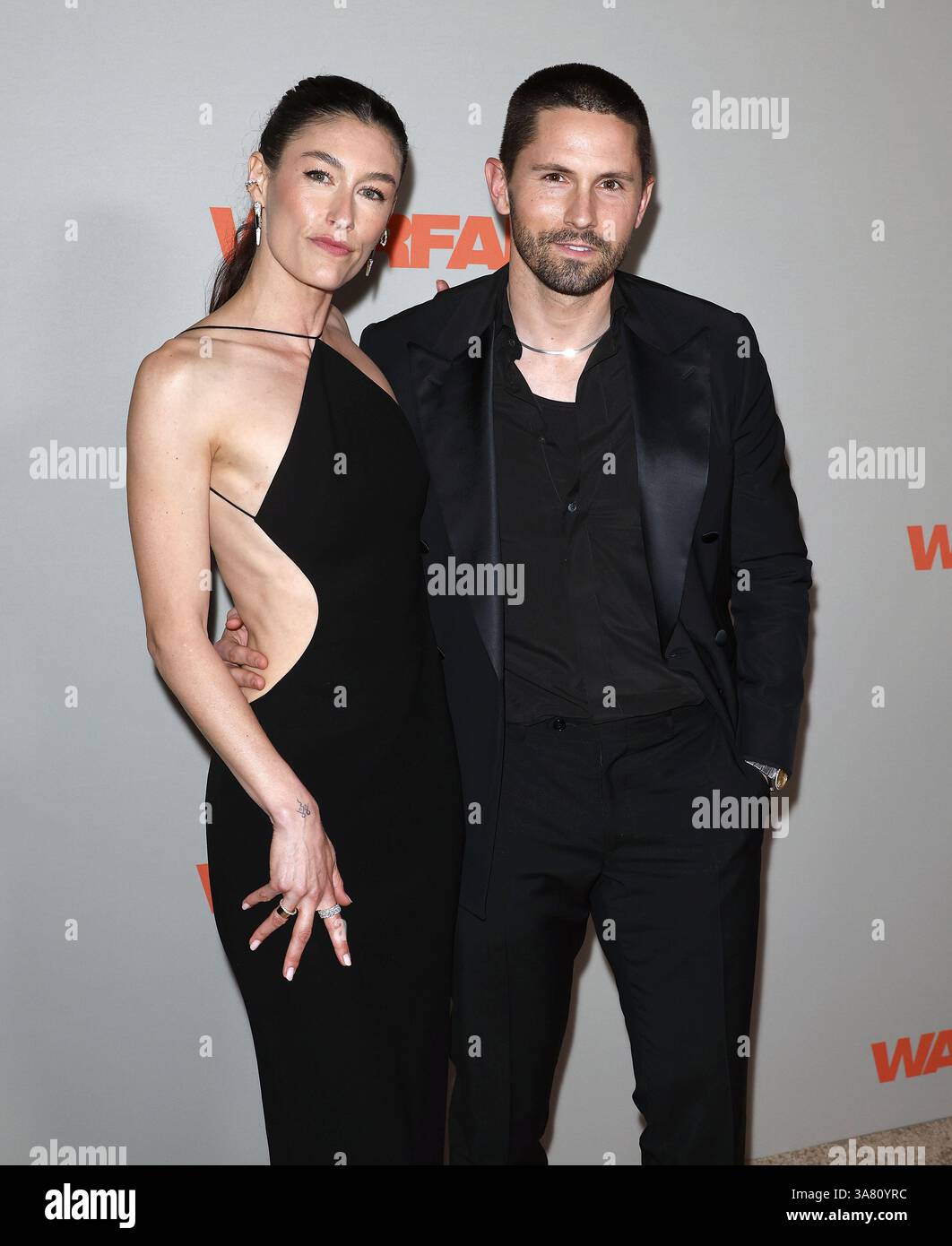 Evan Holtzman arrives at The Los Angeles Red Carpet Premiere of WARFARE ...