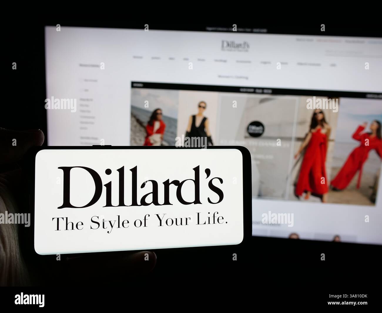 In this photo illustration, a person is holding a smartphone with the ...