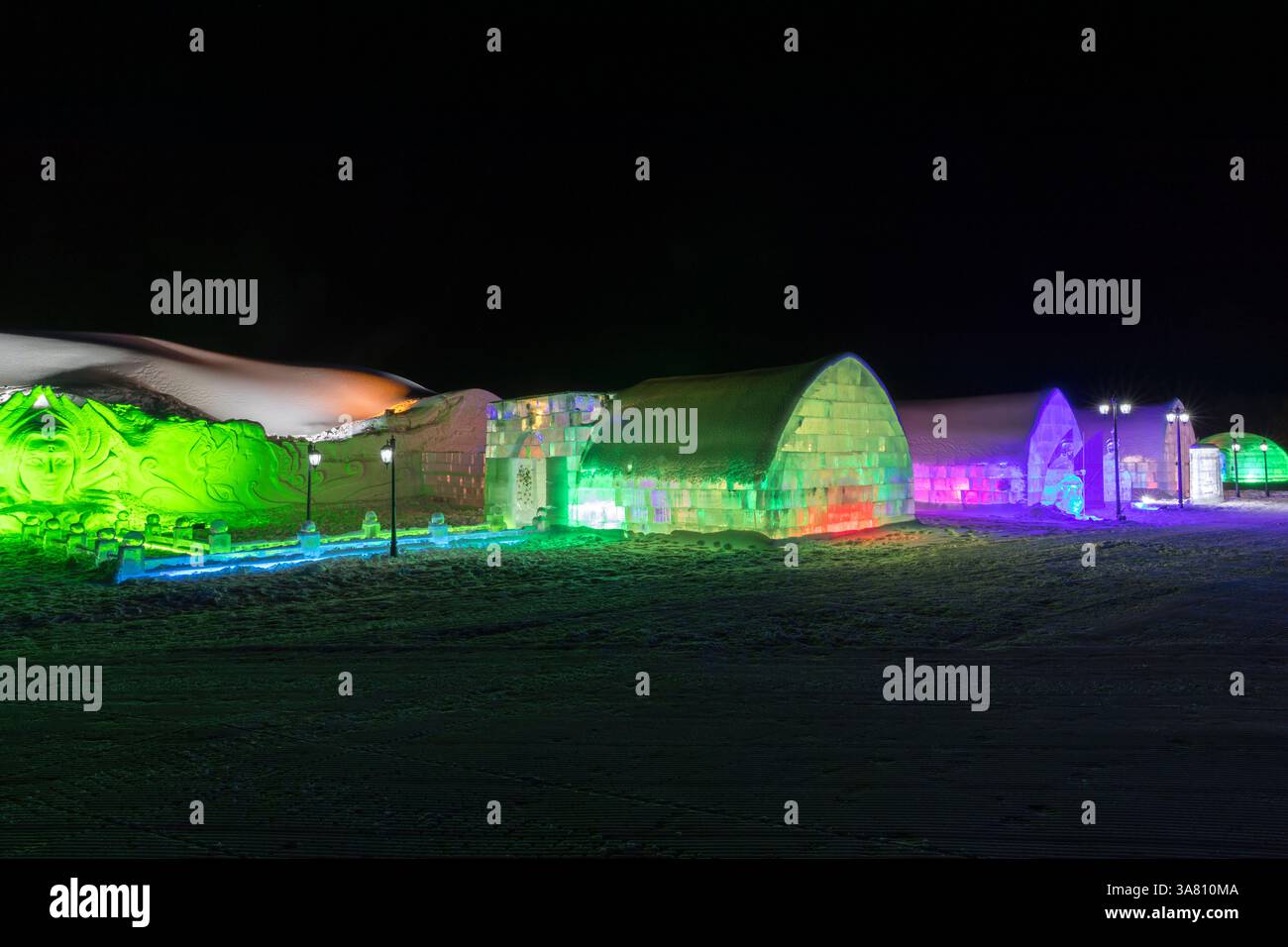 Illuminated Ice Sculpture Display at Night Stock Photo - Alamy