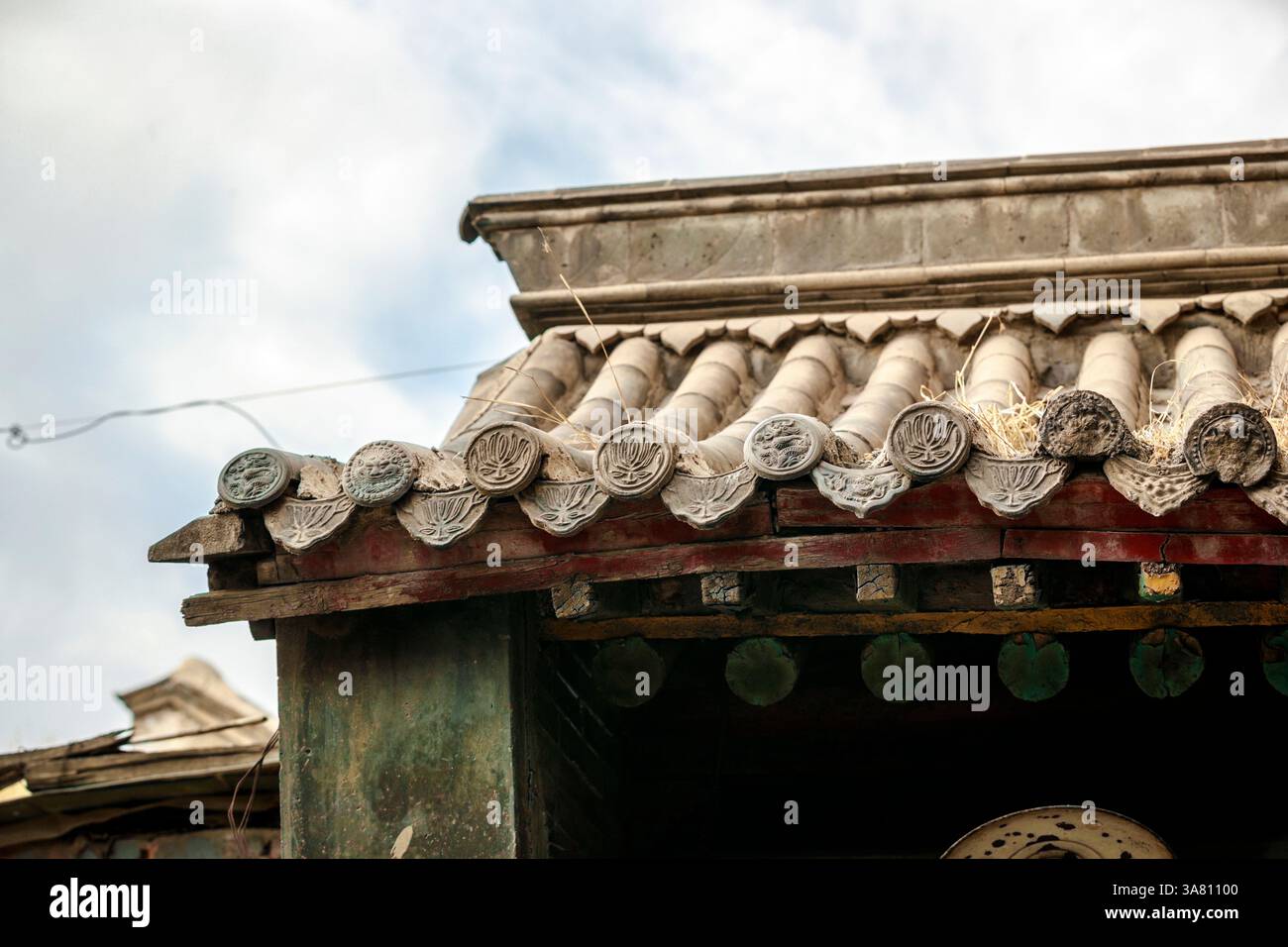 Traditional Roof Tiles with Decorative Elements Stock Photo - Alamy