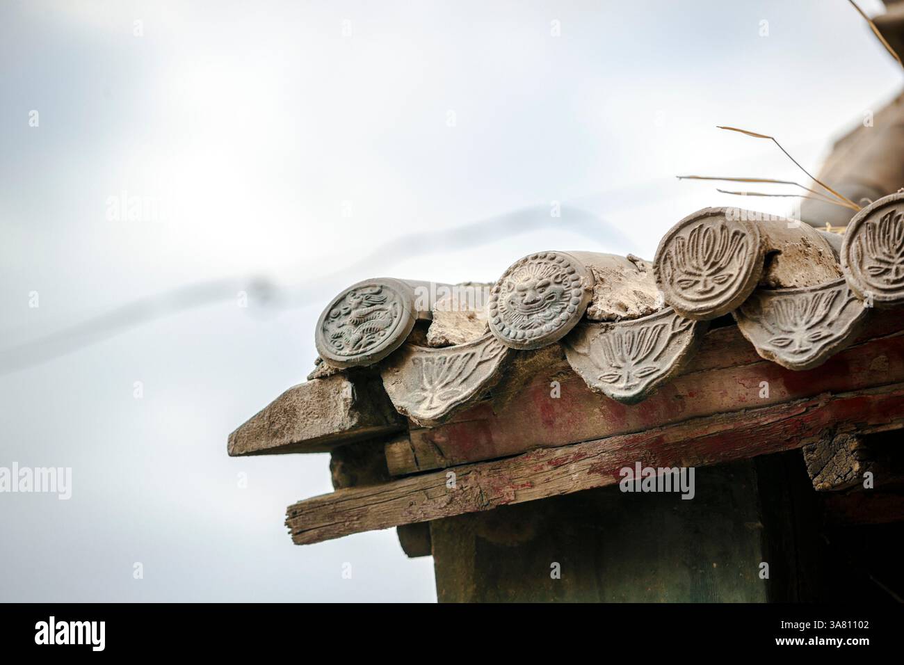 Traditional Roof Tiles with Decorative Elements Stock Photo - Alamy