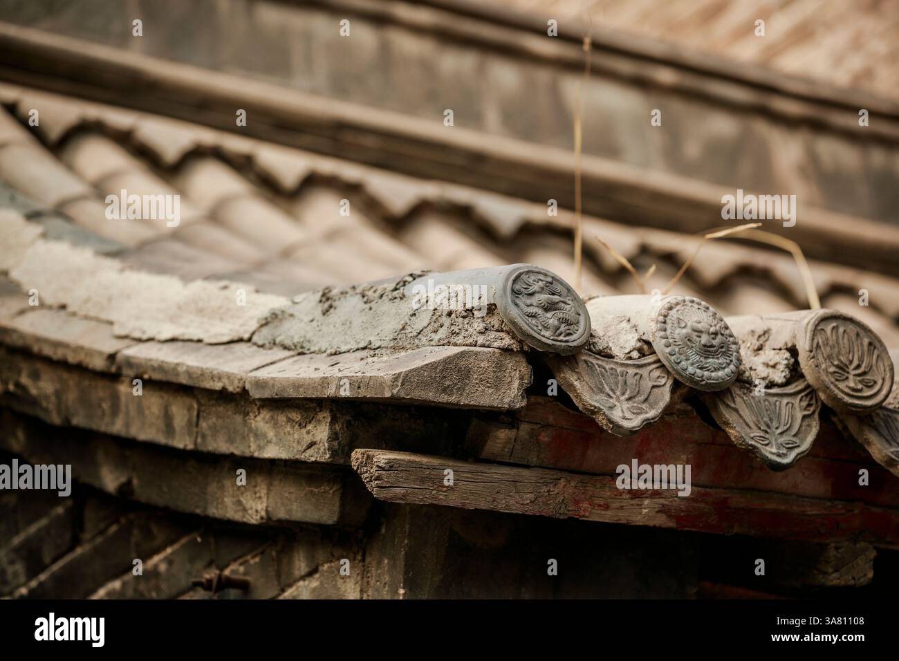 Traditional Roof Tiles with Decorative Elements Stock Photo - Alamy