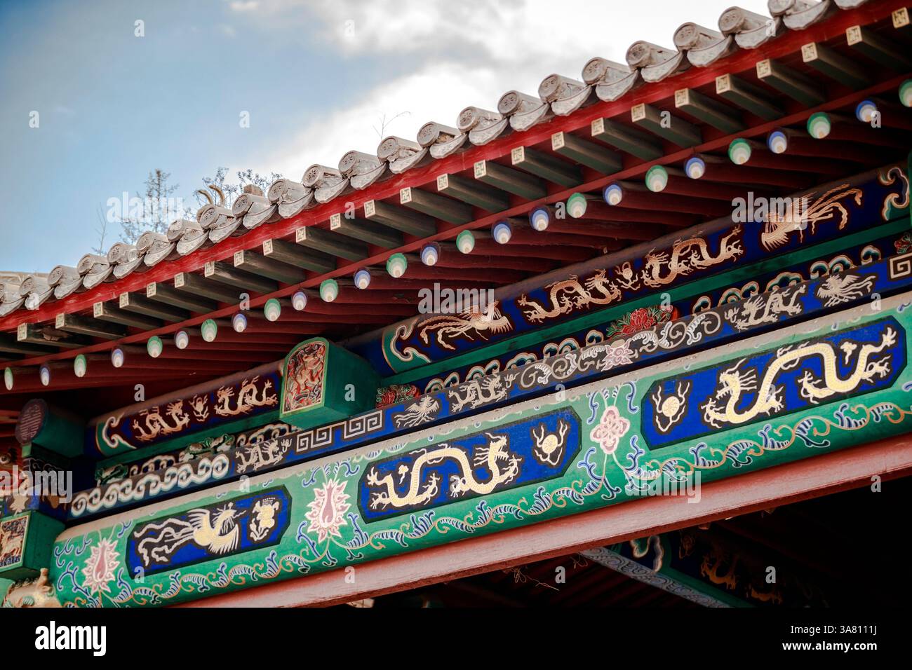 Traditional East Asian Roof with Ornate Carvings and Copper Bell Stock ...
