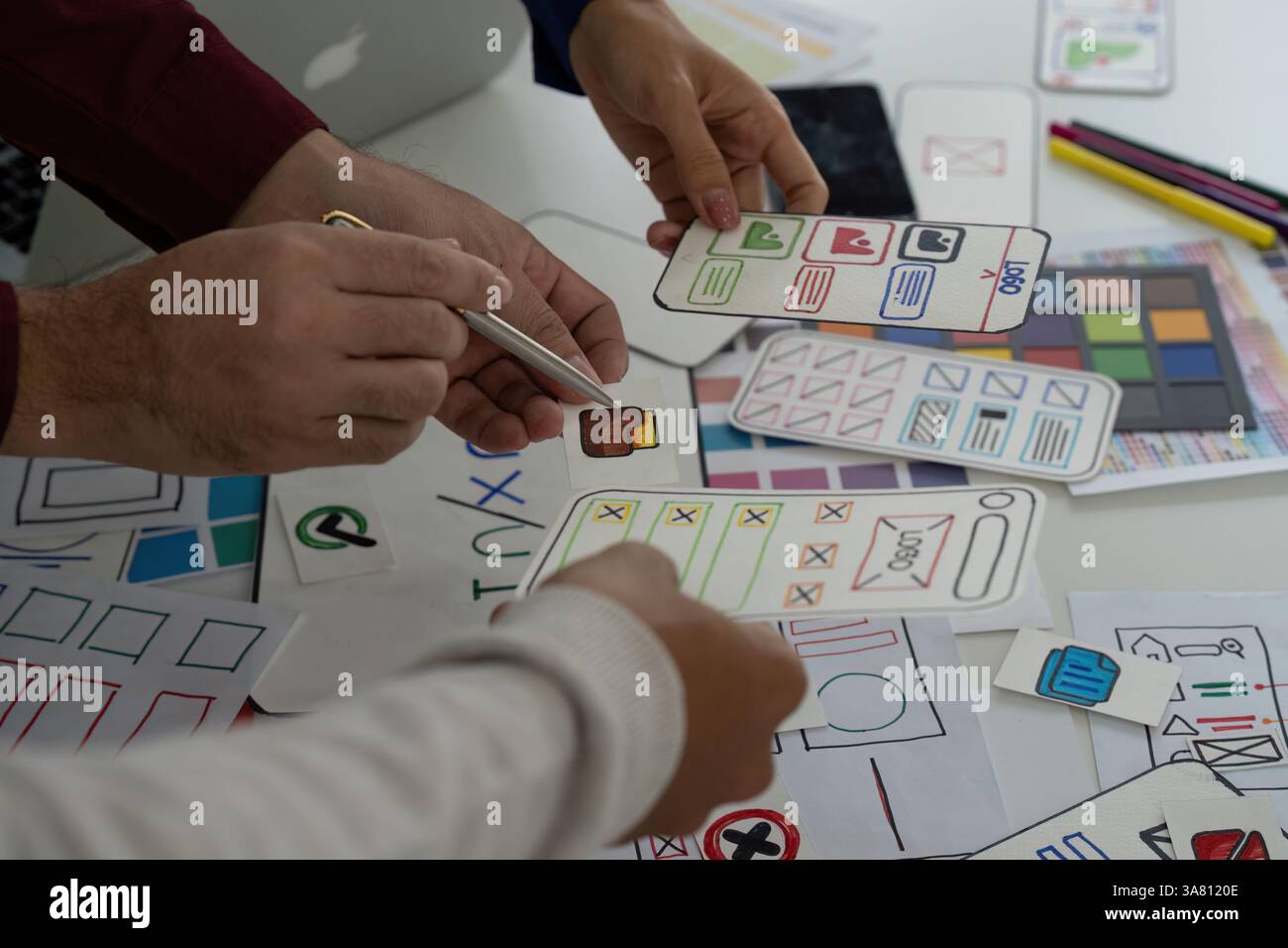 Ux Design Collaboration And Prototyping Team Members Discussing Digital Interface Designs With