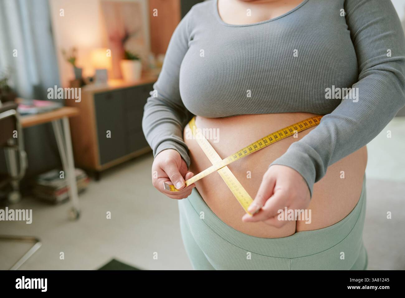 Measuring Waist Circumference with Tape Measure for Fitness Stock Photo ...