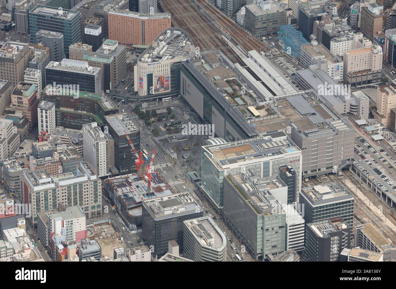 An aerial photo shows the area around JR Hakata Station, where large ...