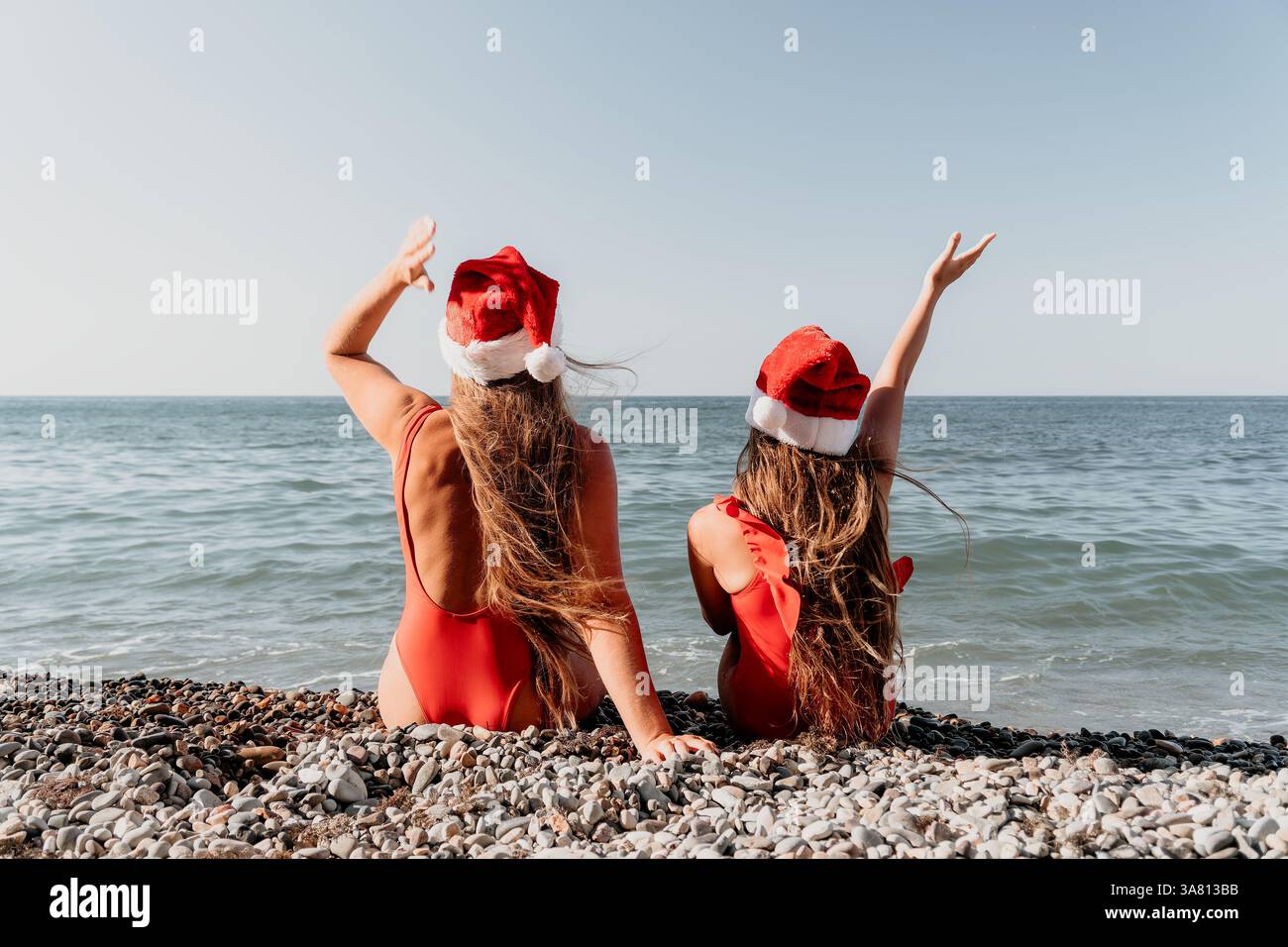 Women in colorful swimsuits hi-res stock photography and images - Alamy
