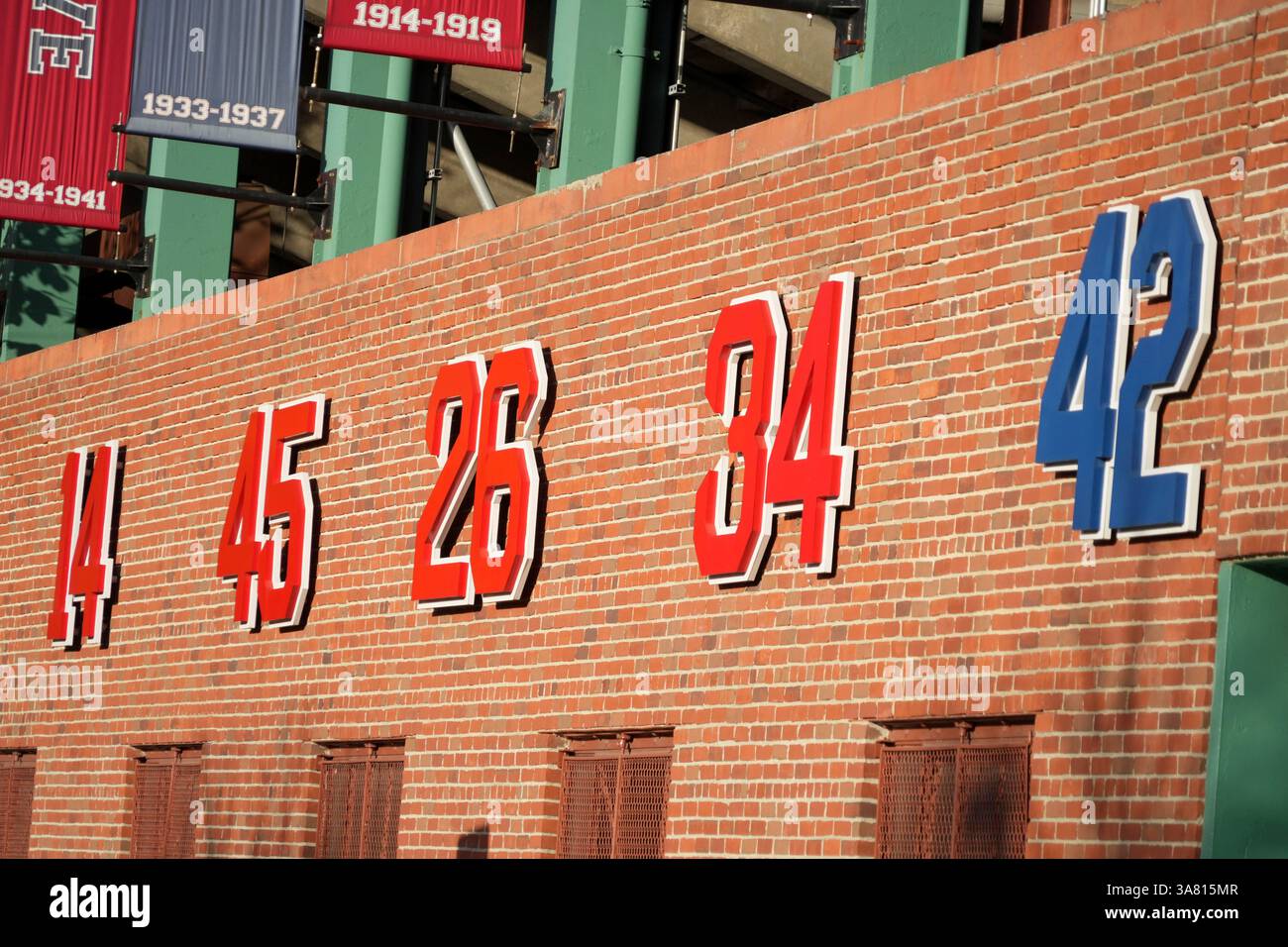 The retired numbers of Boston Red Sox players Jim Rice (14), Pedro ...