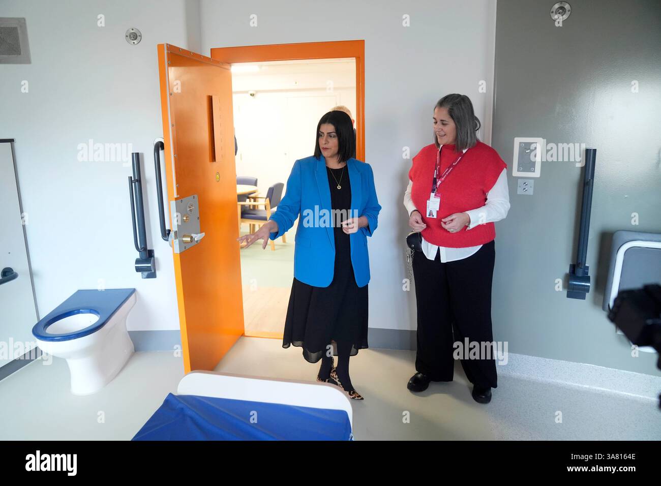 Justice Secretary Shabana Mahmood (left) being given a tour during the ...