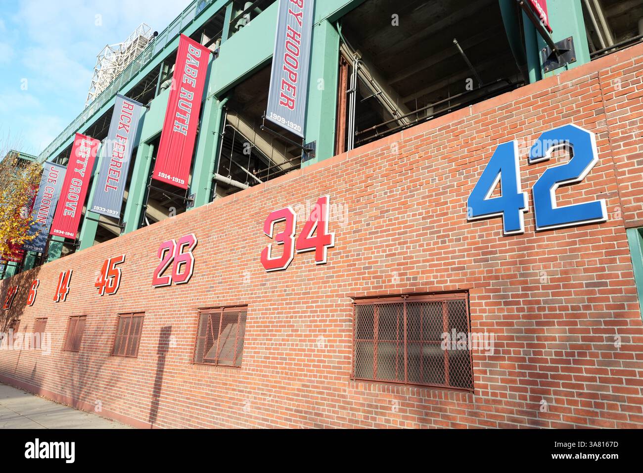 The retired numbers of Boston Red Sox players Jim Rice (14), Pedro ...