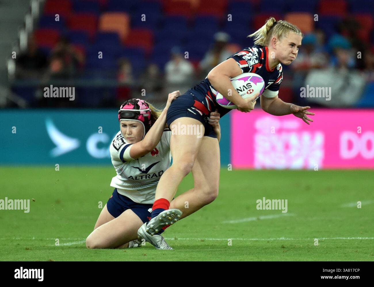 Hong Kong. 28th Mar, 2025. Charlie Gauyat (L) of France defends Grace ...