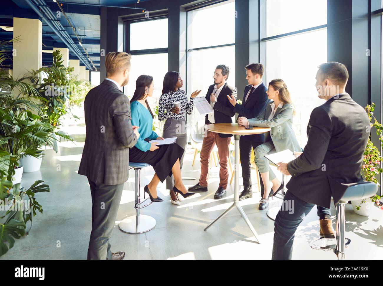Business people diverse group and executive leader talking to happy ...