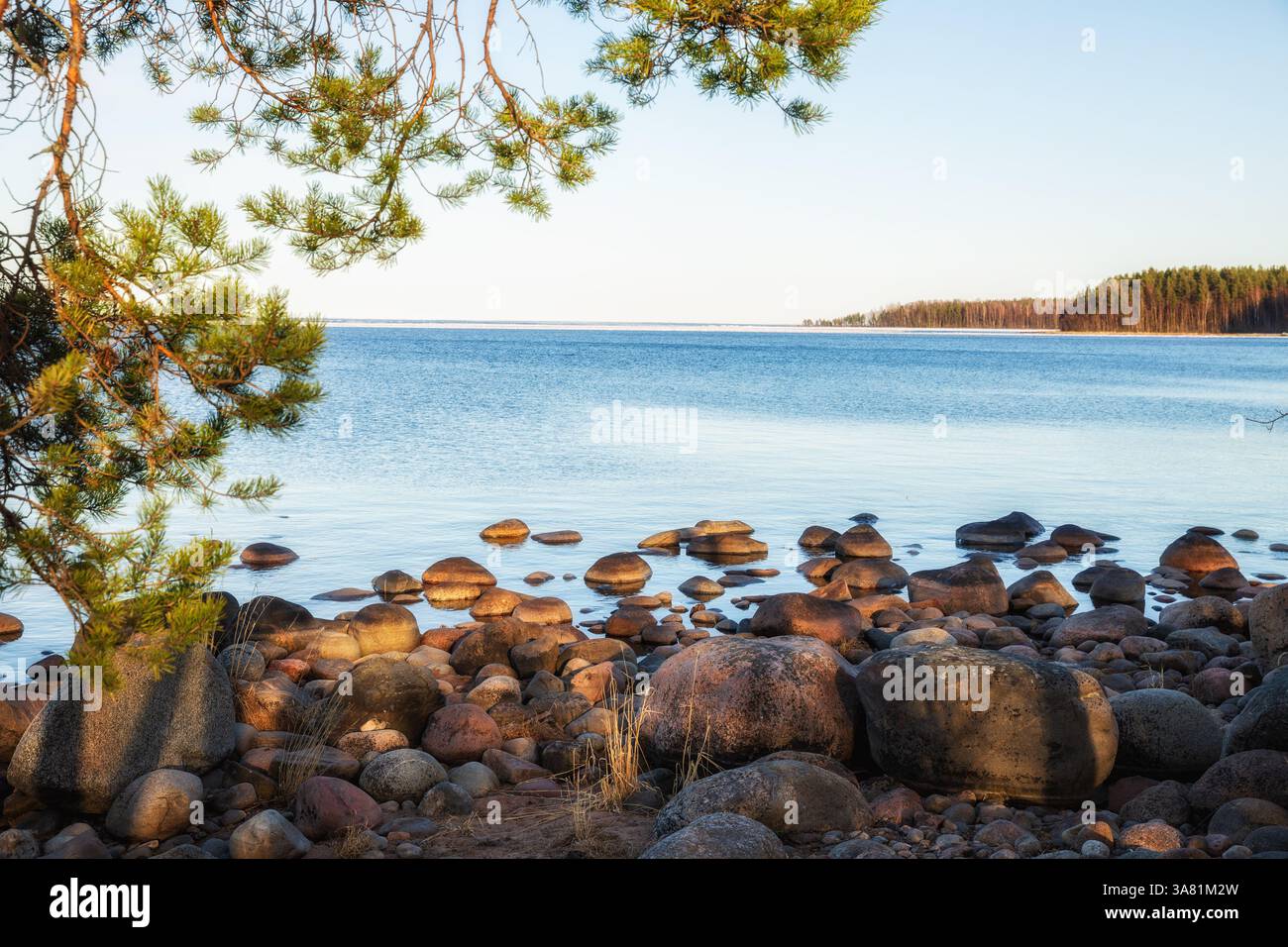 Spring water landscape. The rocky shore of Lake Ladoga in April Stock ...
