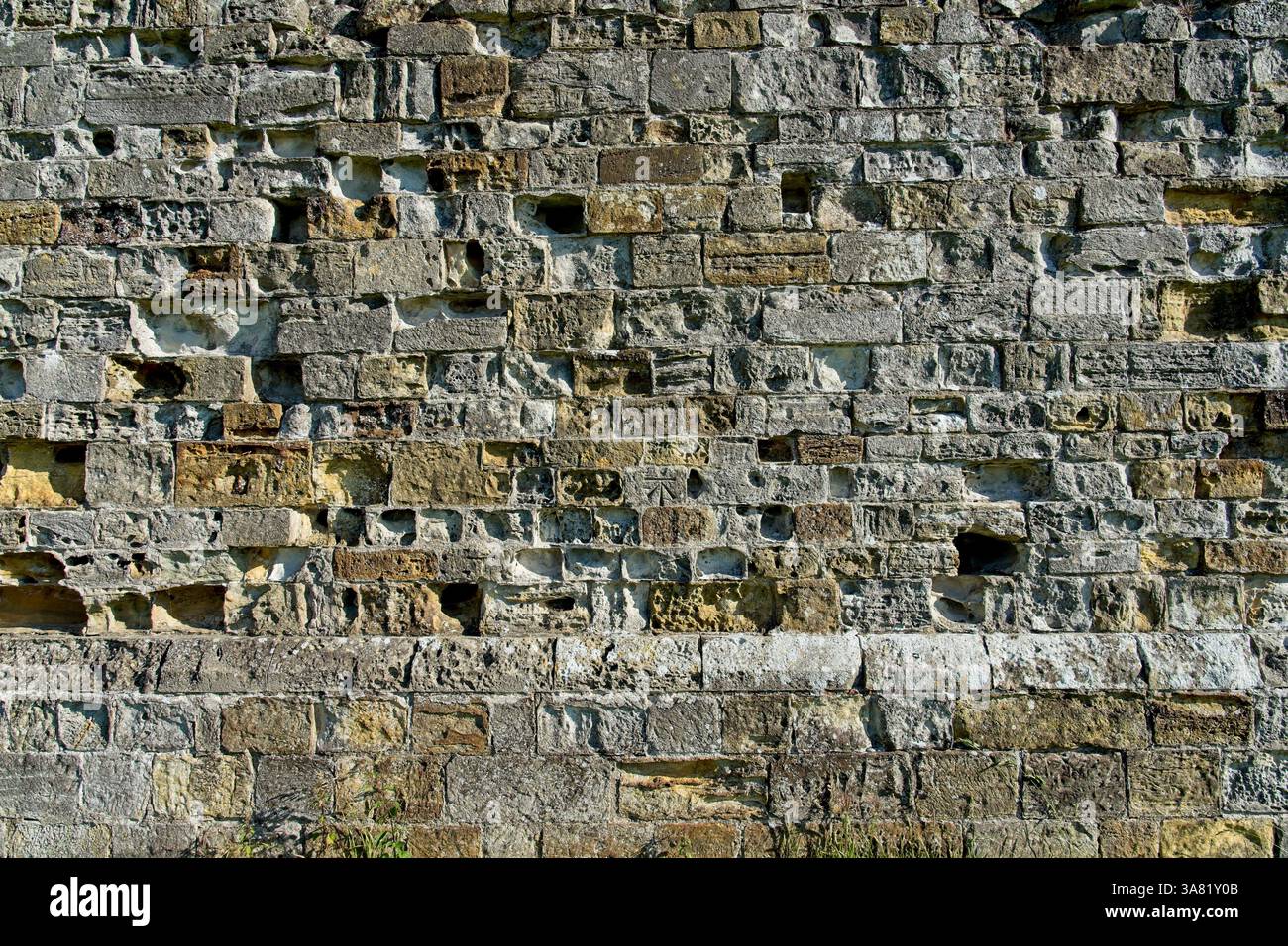 Weathered wall of medieval Camber Castle in Rye a in East Sussex ...