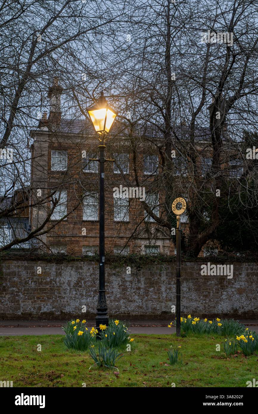 Manor House and street light at dusk. Adderbury, Oxfordshire, England ...