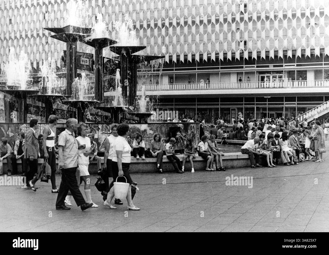 Alexanderplatz in the center of East Berlin with passers-by at the ...