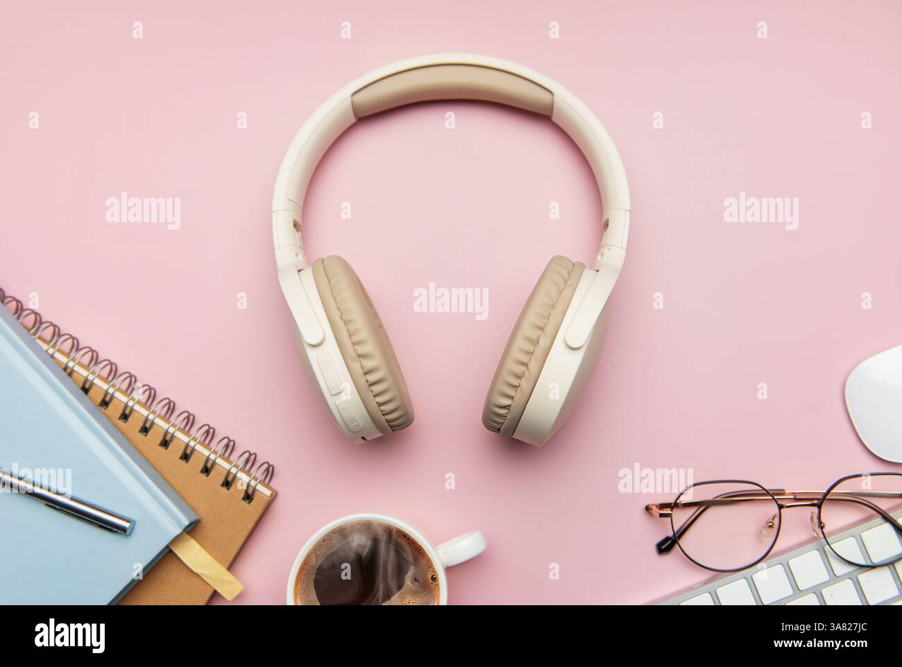 Home office desk workspace with wireless headphones, coffee, keyboard ...
