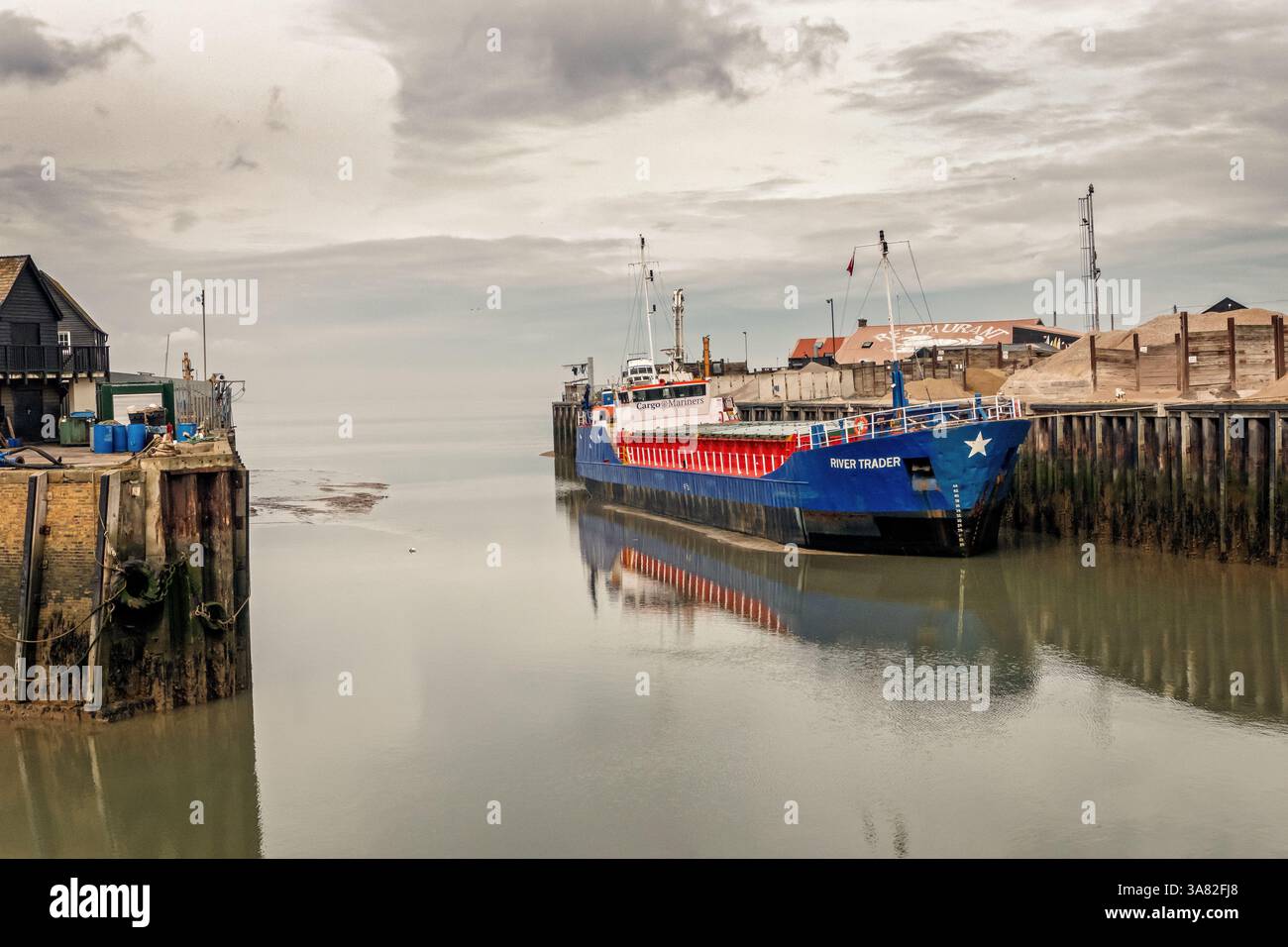 Coastal cargo boat in Whitstable Harbour Kent UK Stock Photo - Alamy