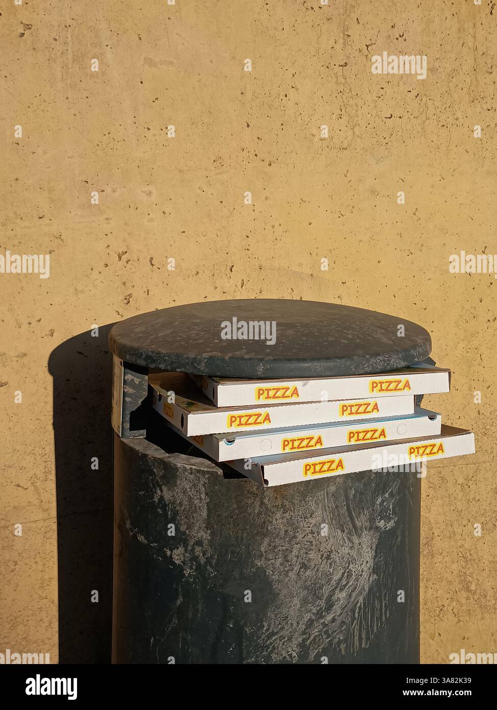Empty Pizza boxes in a public trash can in the street Stock Photo - Alamy