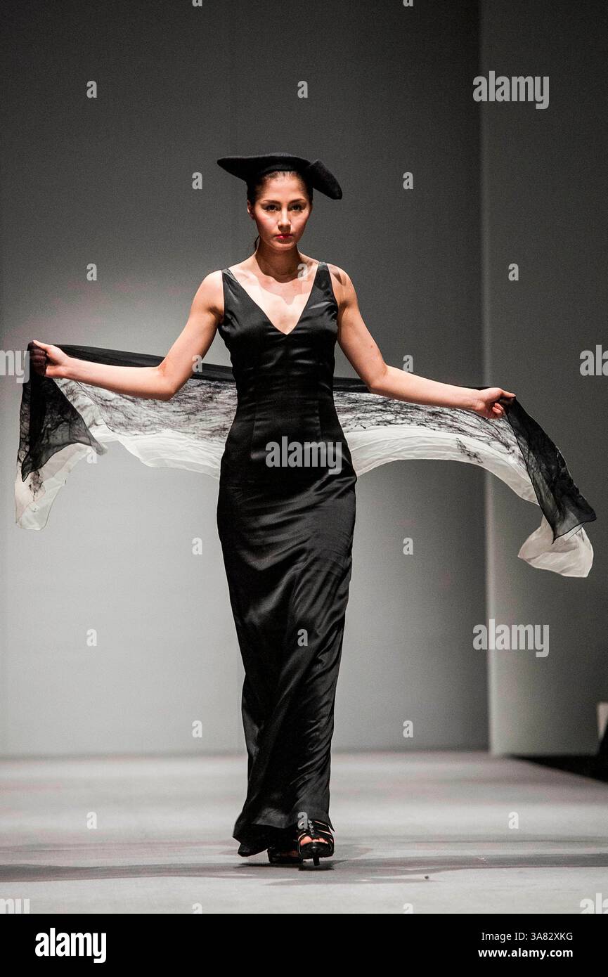 Jan. 16, 2013 - Hong Kong, China - A model showcases designs on the ...