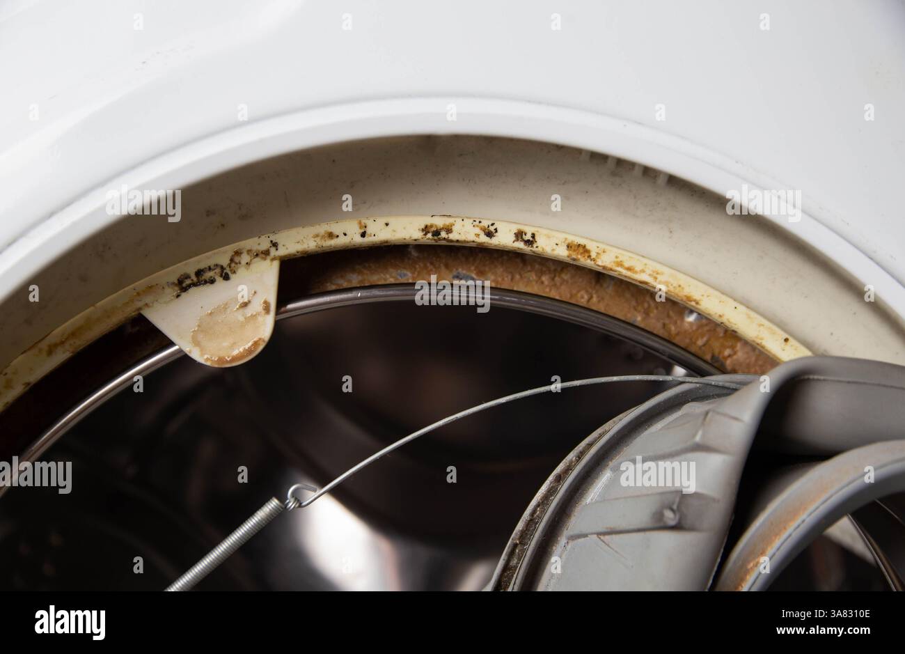 Old rubber hatch seal with washing machine defect Stock Photo - Alamy