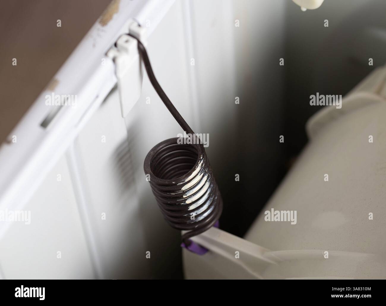 suspension spring of the washing machine tank to dampen vibration when ...