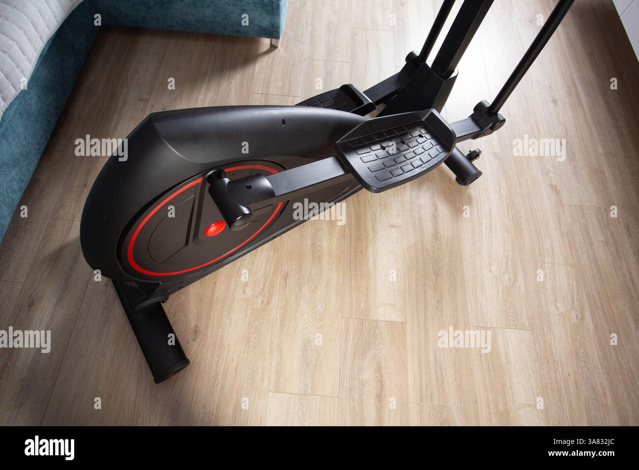 New modern elliptical trainer at home in the exercise room Stock Photo ...
