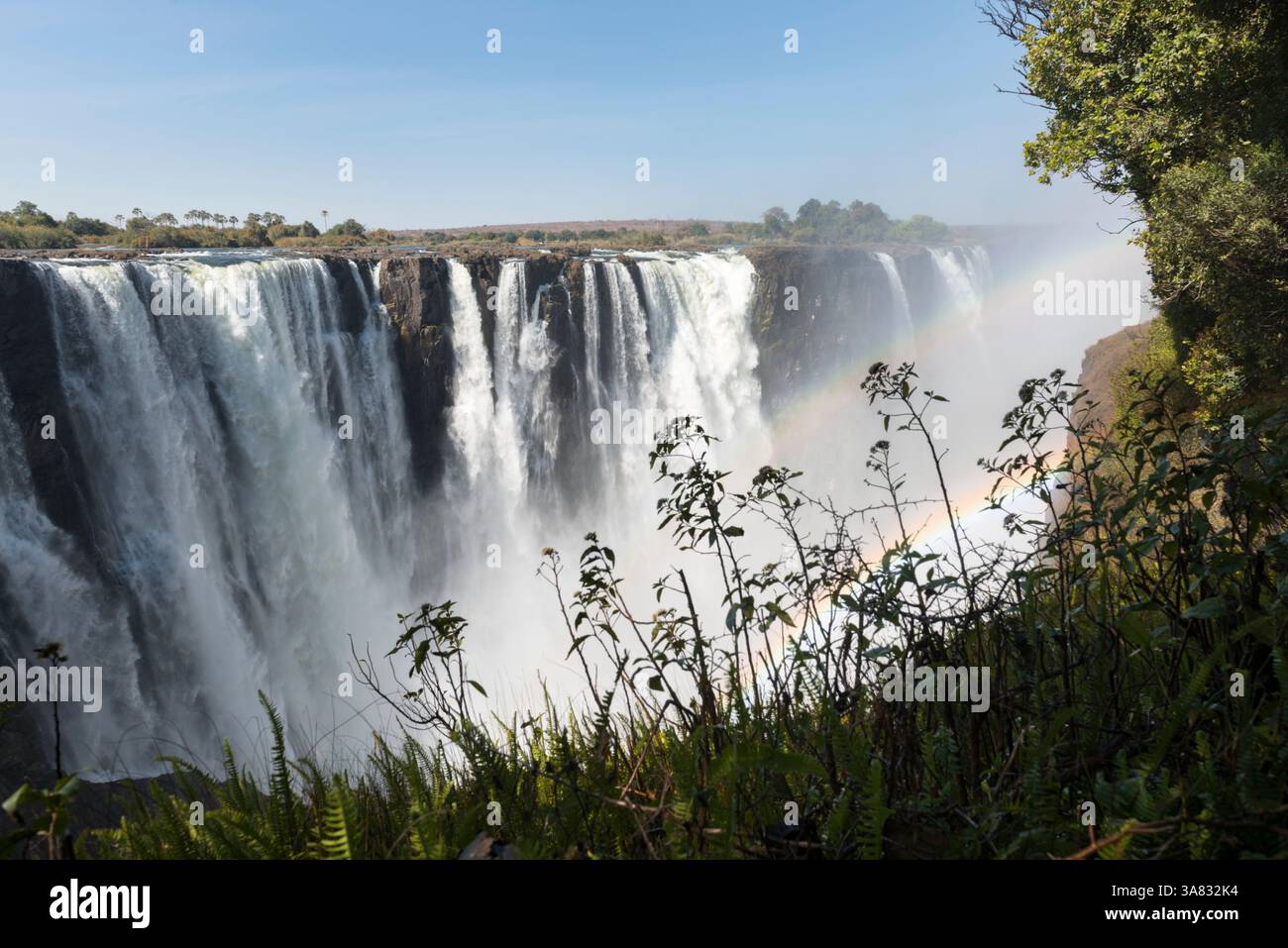 Waterfall rainbow at Victoria Falls as seen from Victoria Falls ...