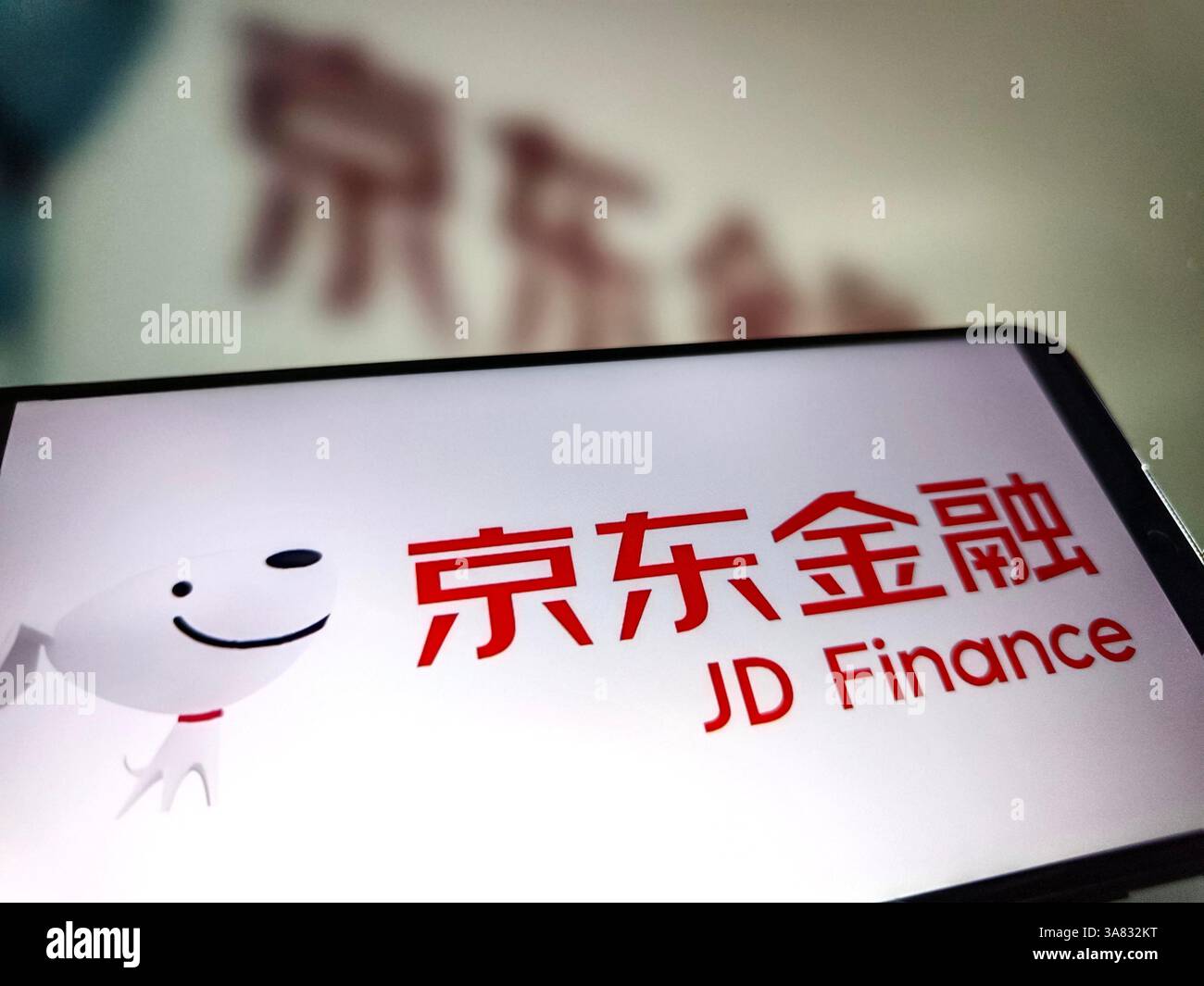 SUQIAN, CHINA - MARCH 28, 2025 - An illustration shows JD Finance LOGO displayed on a smartphone ...