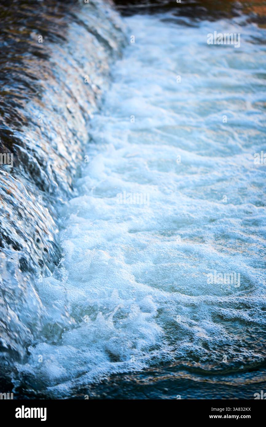 Flowing Stream with Small Waterfall Stock Photo - Alamy