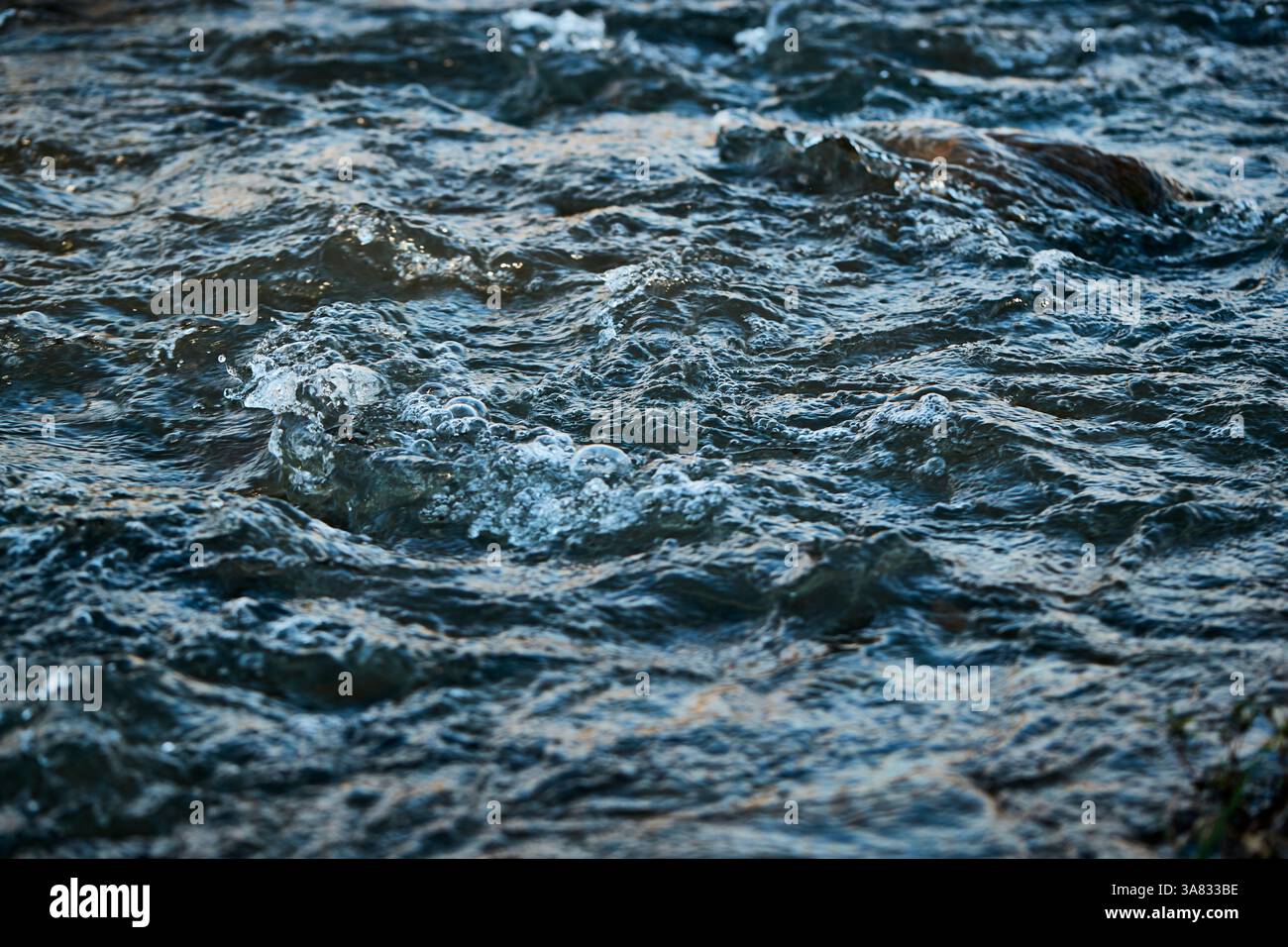 Flowing Stream with Small Waterfall Stock Photo - Alamy
