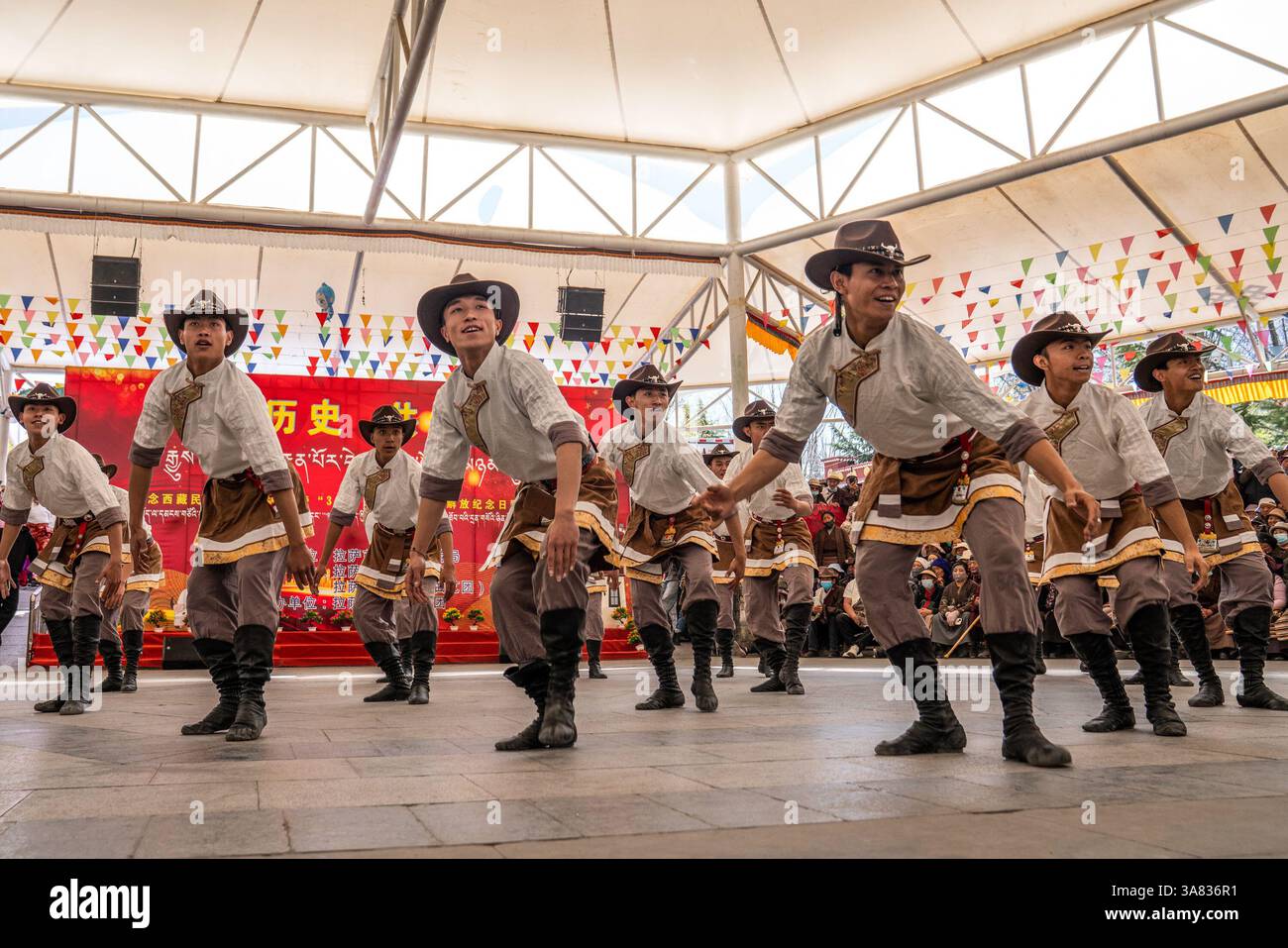 (250328) -- LHASA, March 28, 2025 (Xinhua) -- People dance at a park to ...