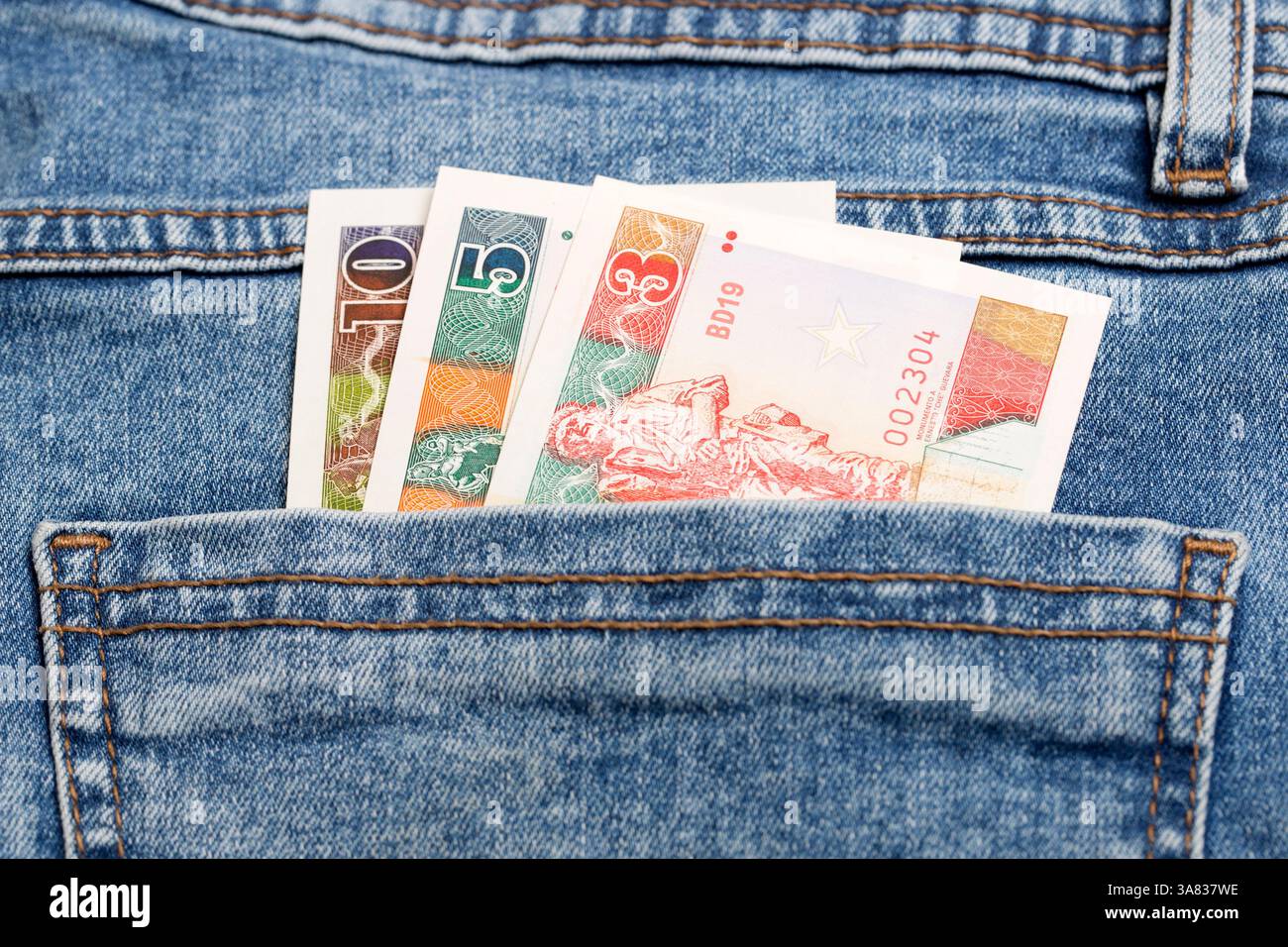 Cuban money - convertible pesos in the pocket of blue jeans Stock Photo ...
