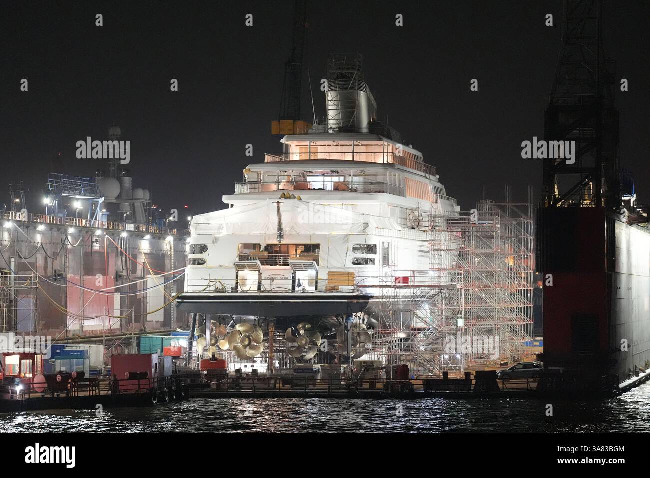 Hamburg, Germany. 27th Mar, 2025. The mega yacht "Rising Sun" lies in a ...