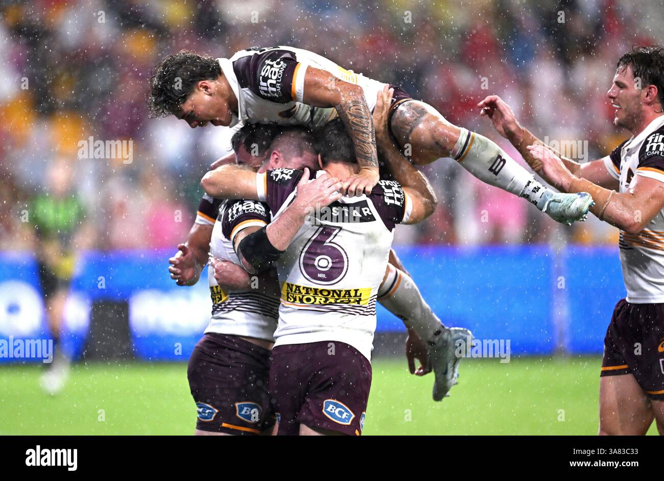 Reece Walsh of the Broncos reacts after Corey Paix of the scored a try ...