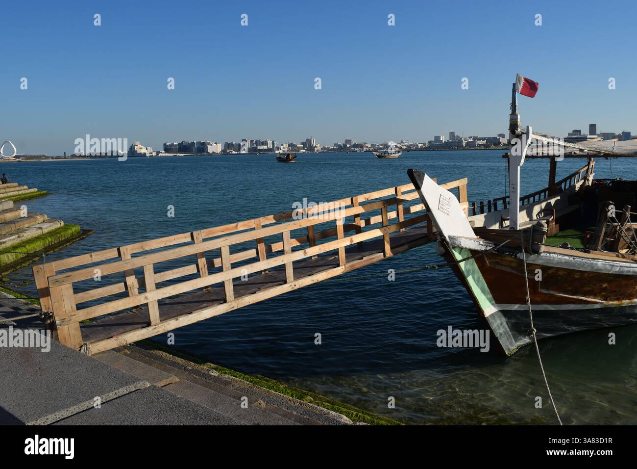 Gateway to Qatari Heritage: A traditional dhow with its wooden ...