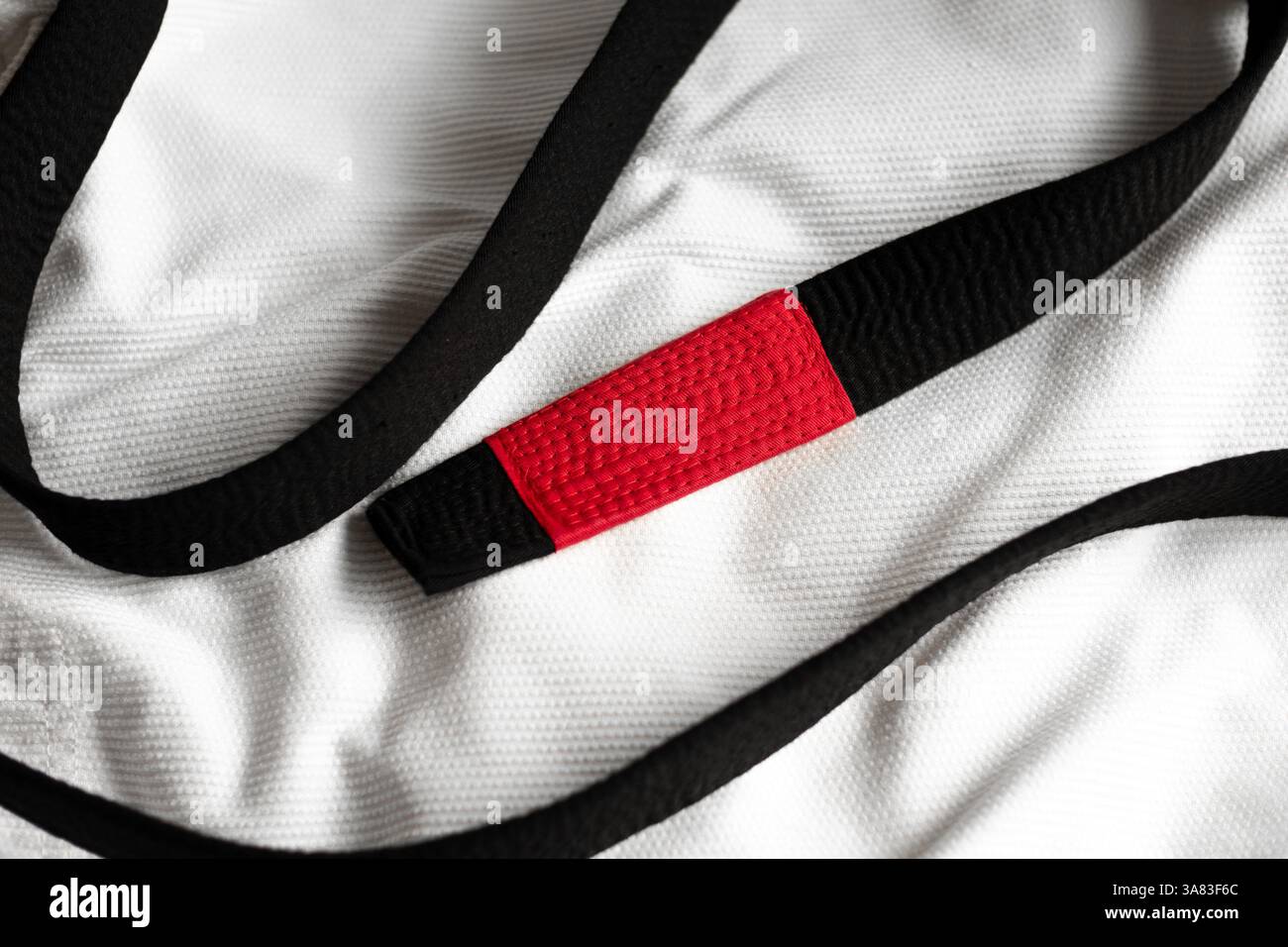 A Brazilian Jiu Jitsu Gi and a Black Belt Stock Photo - Alamy